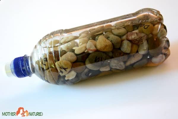 Pebble discovery bottle for early literacy fun! - Mother Natured